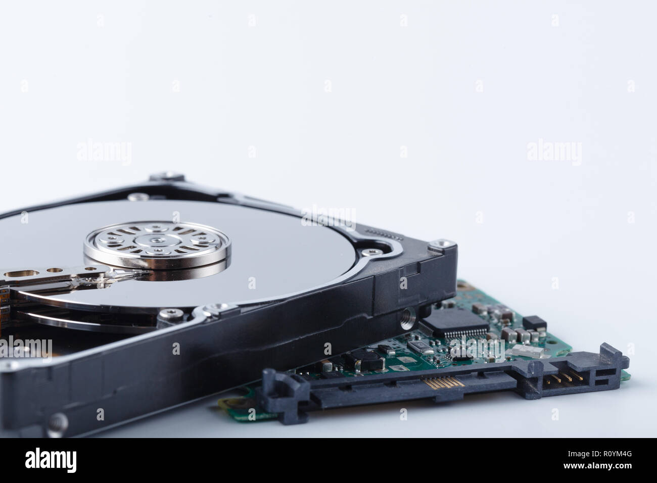 Close up inside of computer hard disk drive HDD on white background ...