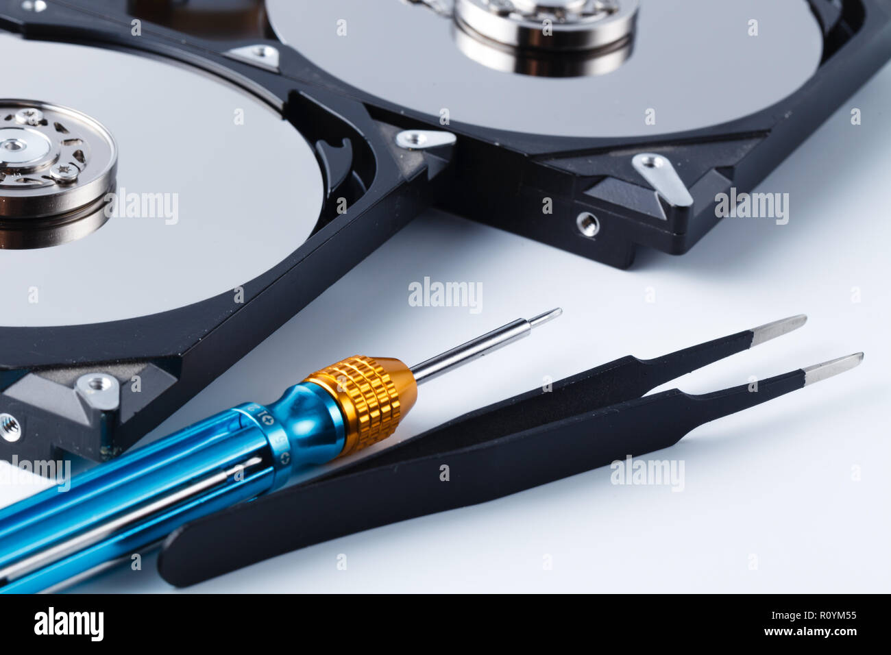 repair hard drive concept on white background with tools Stock Photo ...