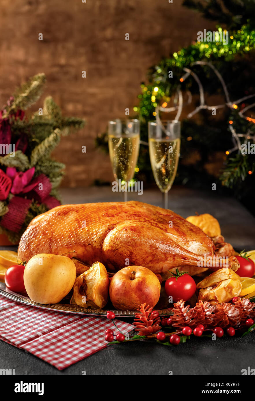 Thanksgiving roasted whole goose on rustic table Stock Photo - Alamy