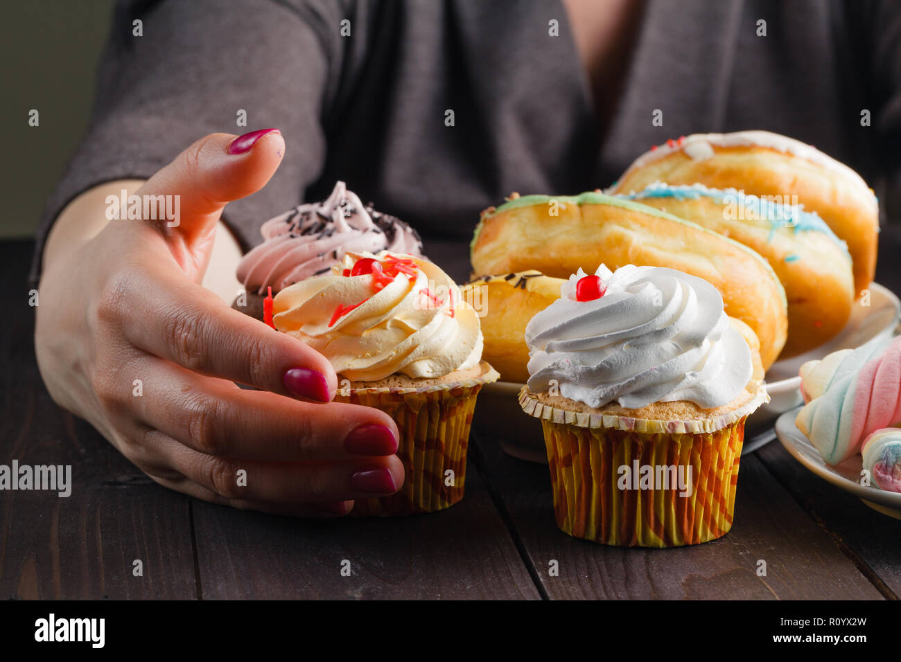 how many sweets and donuts you can eat at once Stock Photo - Alamy