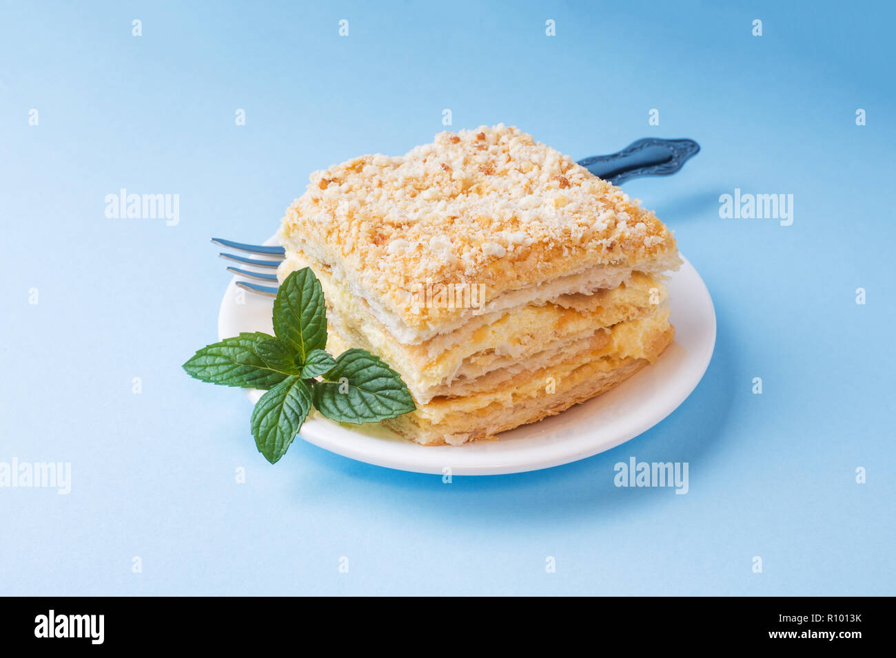 Layer cake with cream Napoleon millefeuille vanilla slice with mint on ...