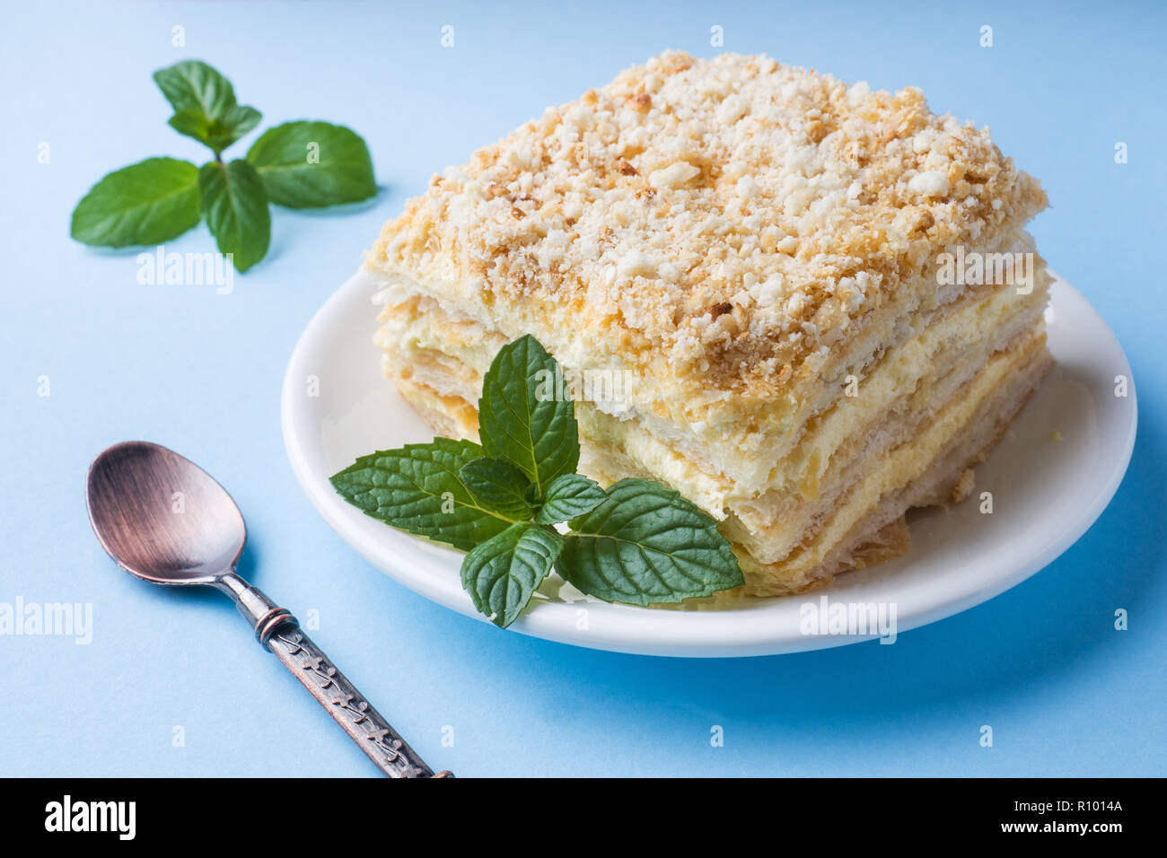 Layer cake with cream Napoleon millefeuille vanilla slice with mint on ...