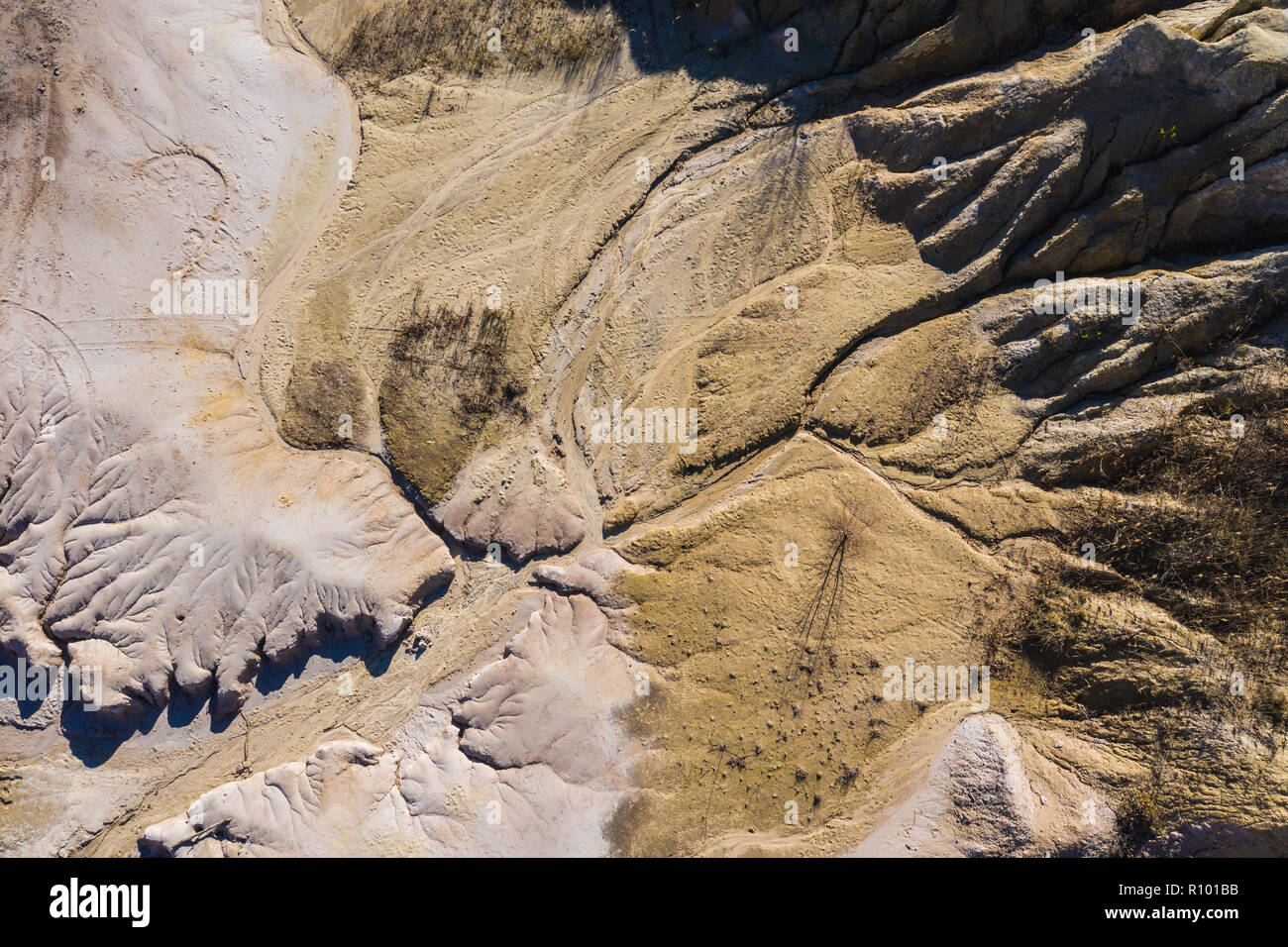 Surrealistic aerial image of abandoned opencast mine. Bad land pattern ...