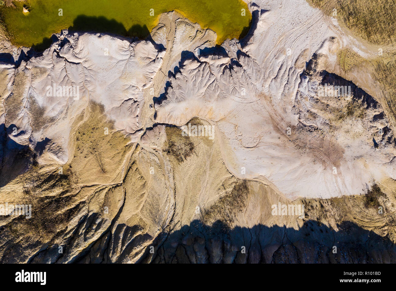 Surrealistic aerial image of abandoned opencast mine. Bad land pattern ...