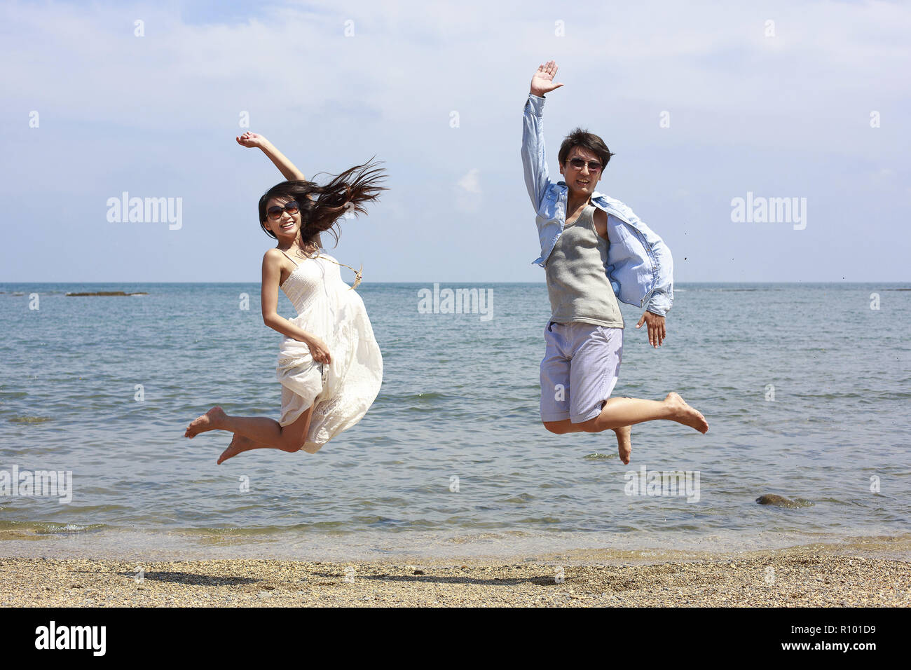 couple by the sea Stock Photo - Alamy