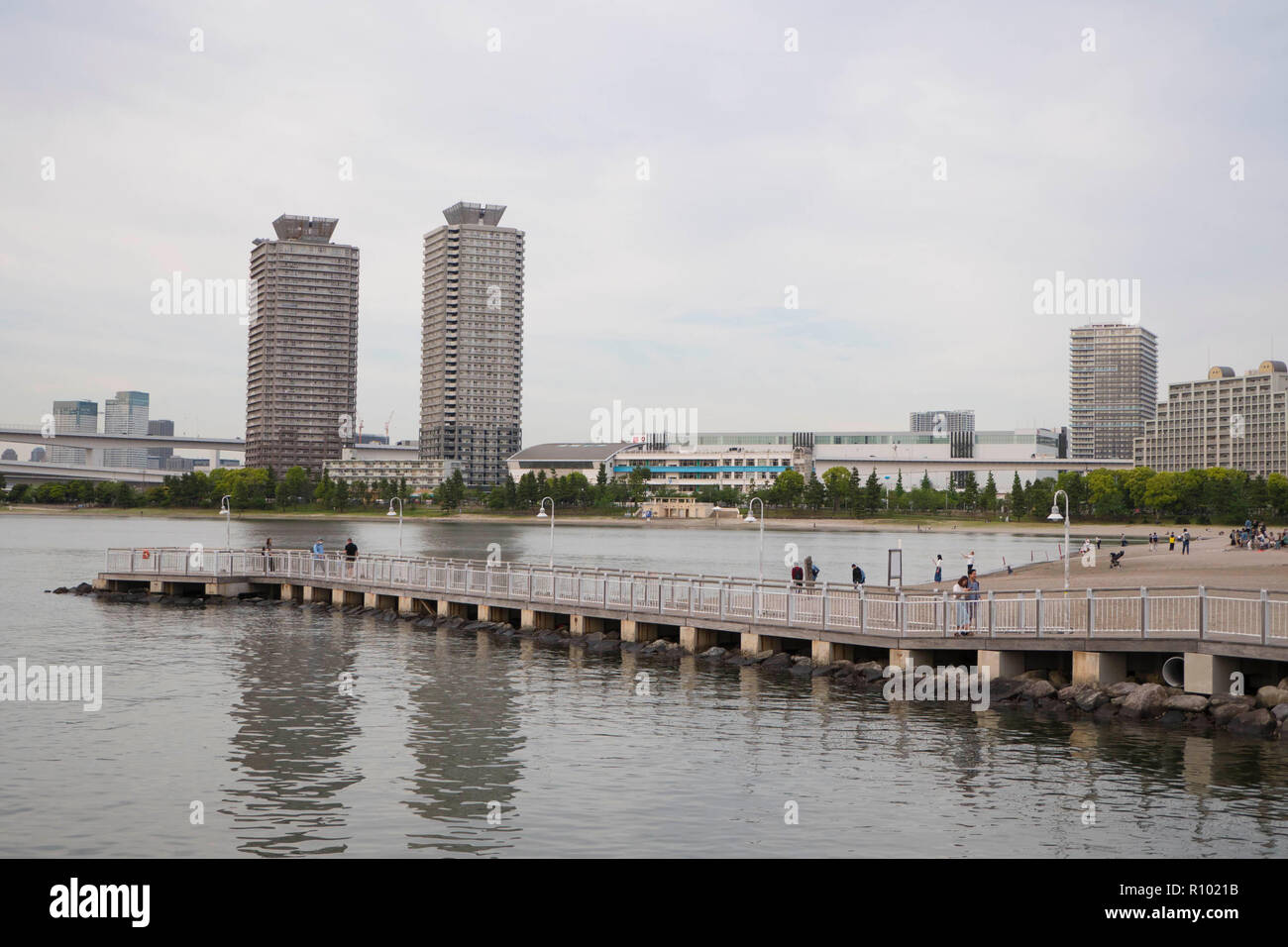 People walk on a pier at Odaiba Seaside park in Tokyo, Japan Stock ...