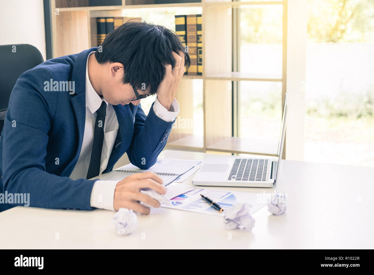 Depressed failure and tired businessman late sad and solving problem in ...