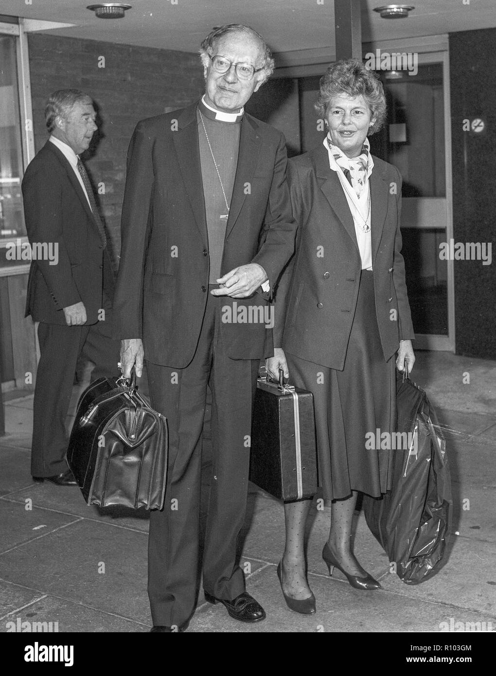 The Archbishop of Canterbury Robert Runcie leaving Heathrow Airport in ...
