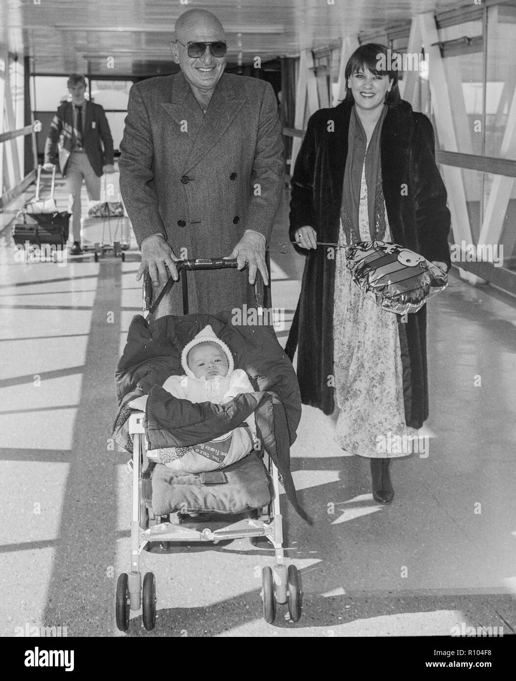 Actor Telly Savalas, wife Julie and son Christian at Heathrow Airport ...