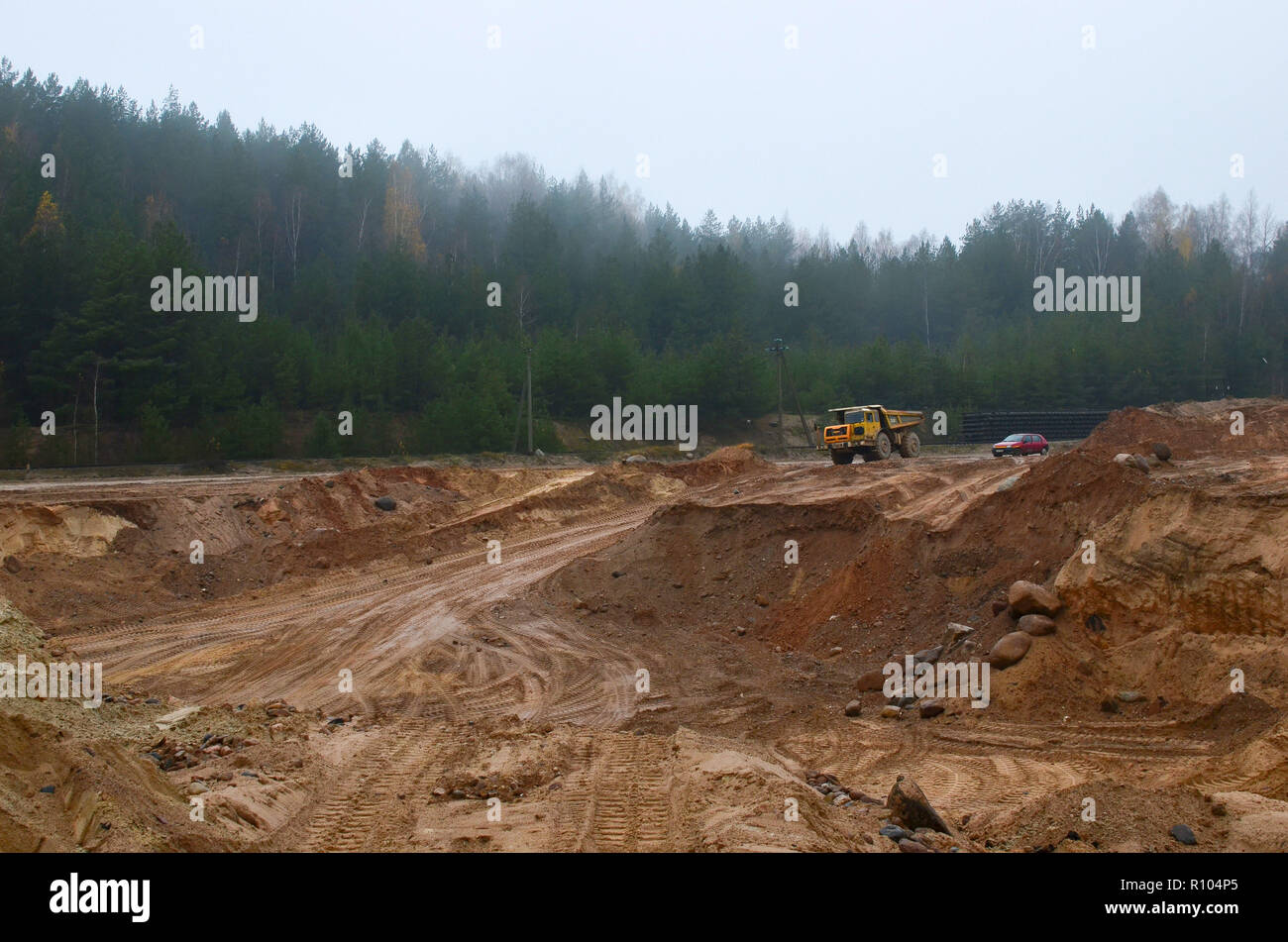 Heavy large quarry dump truck. Big wheels. The work of construction ...