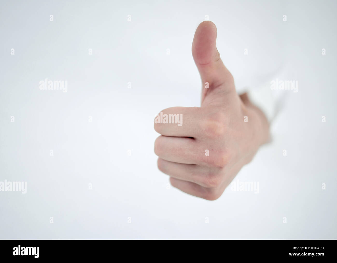 man's hand breaking through the paper wall and pointing at you Stock ...