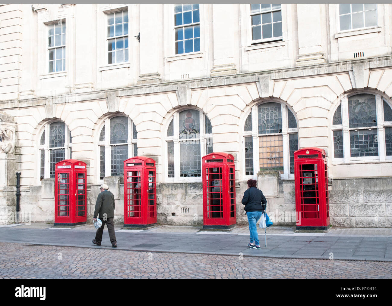 Row of four old style K2 phone boxes outside old General Post Office ...