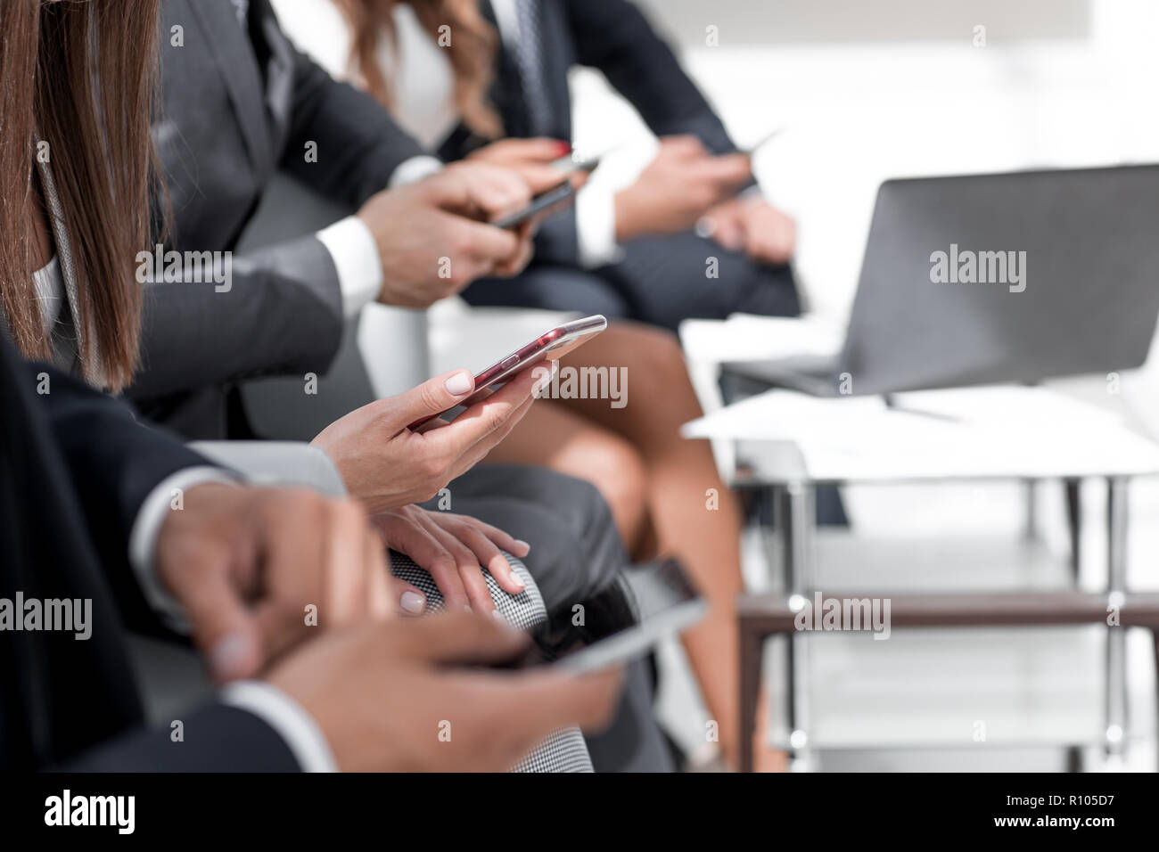 Many people using smart devices hi-res stock photography and images - Alamy