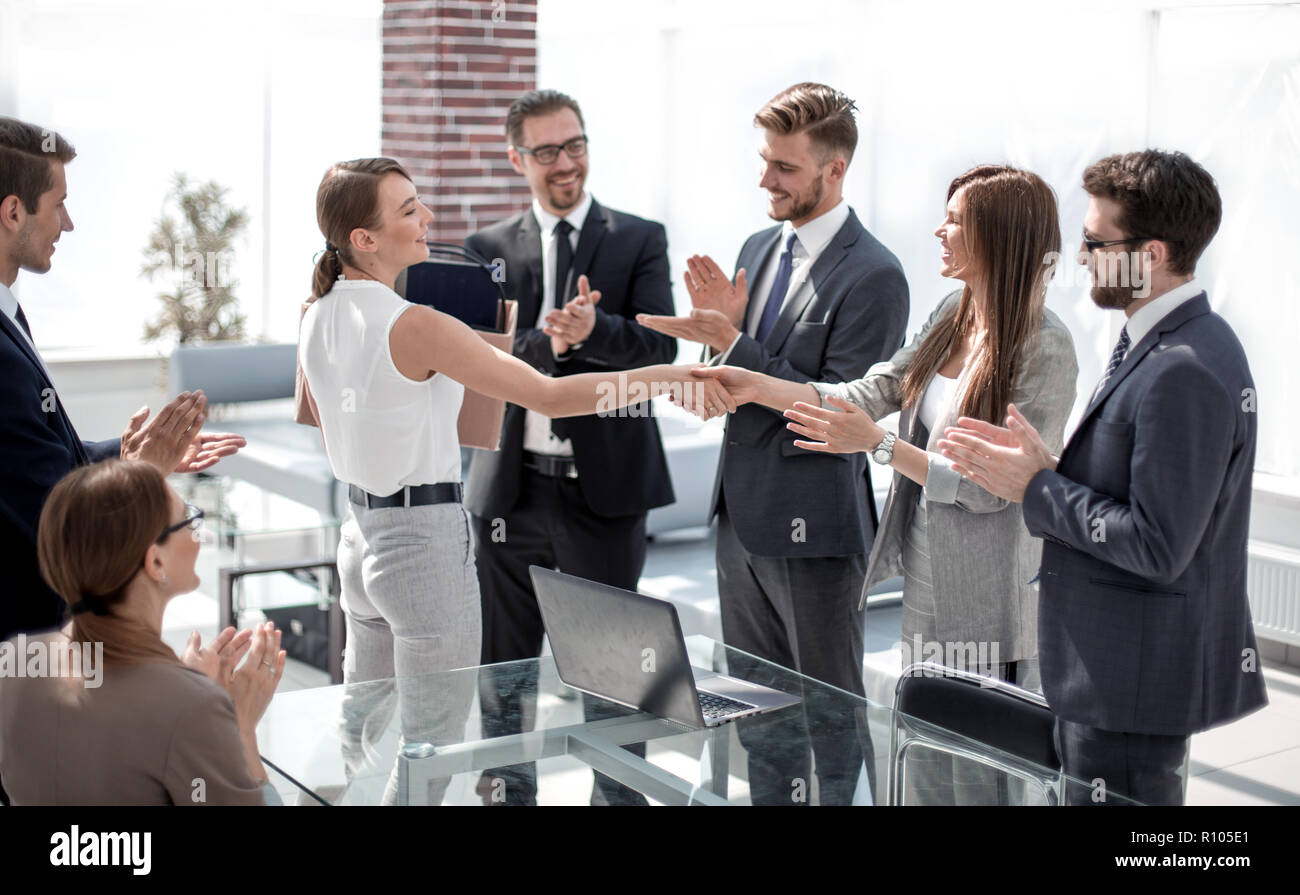 welcome handshake between colleagues at the new workplace Stock Photo ...