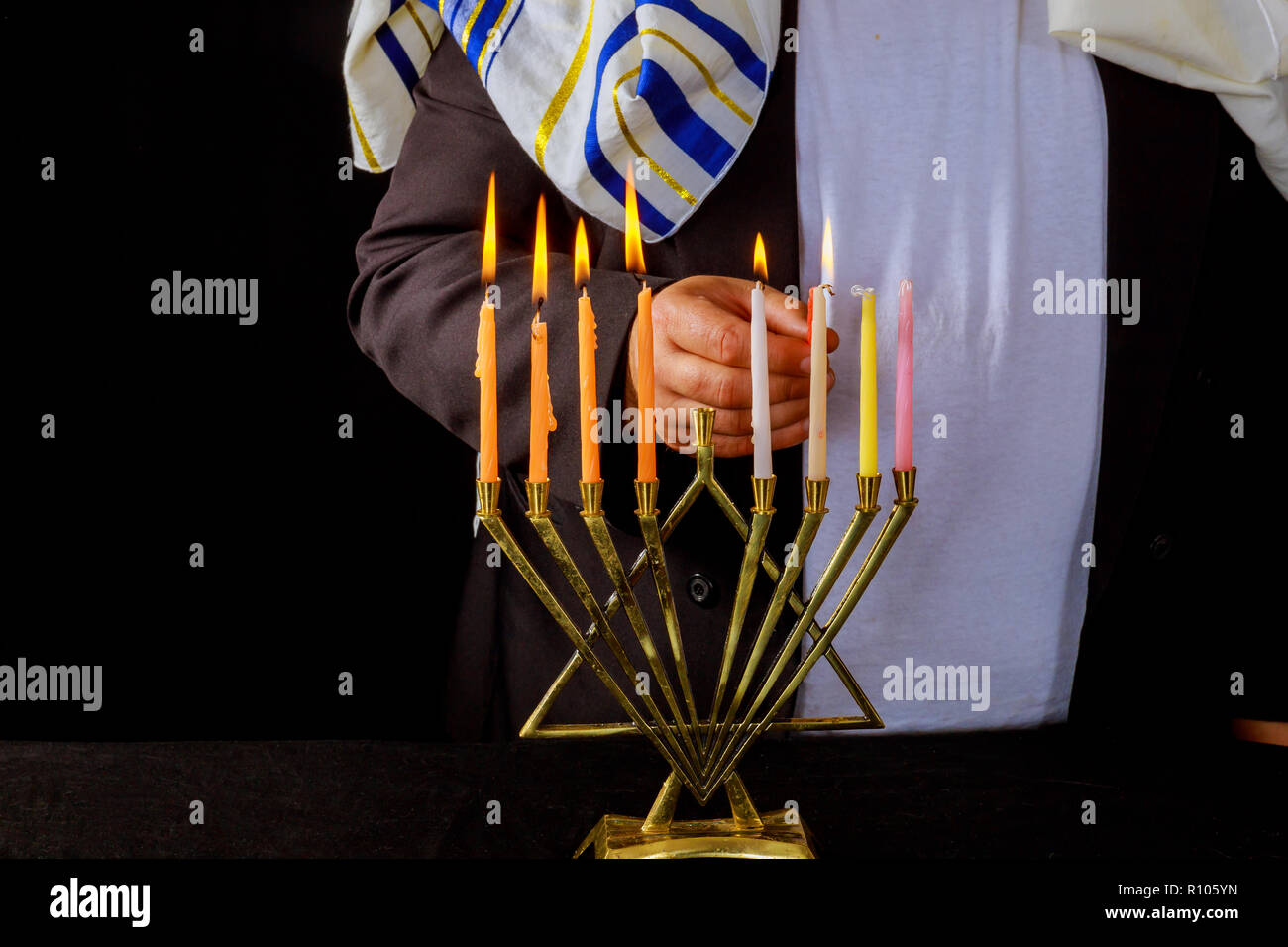 Jewish man blessings Chanukah menorah traditional Hanukkah Stock Photo ...