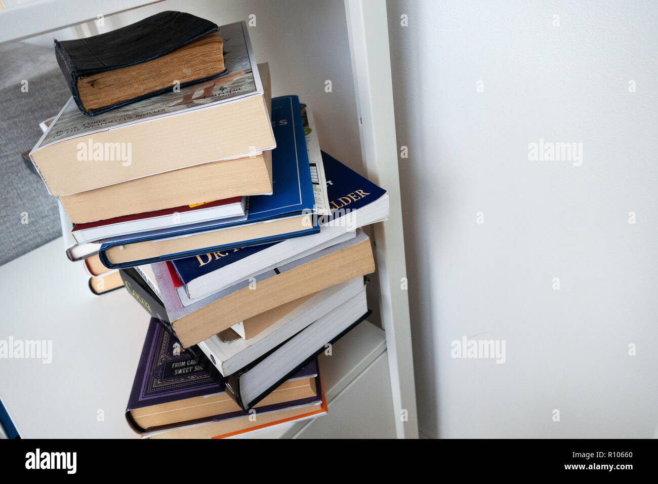Very tall pile of stacked books hi-res stock photography and images - Alamy