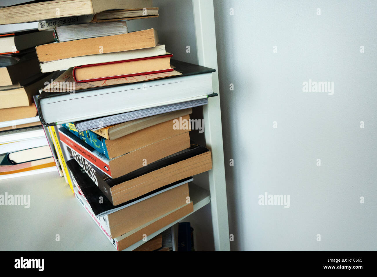 Books stack vintage tall hi-res stock photography and images - Alamy
