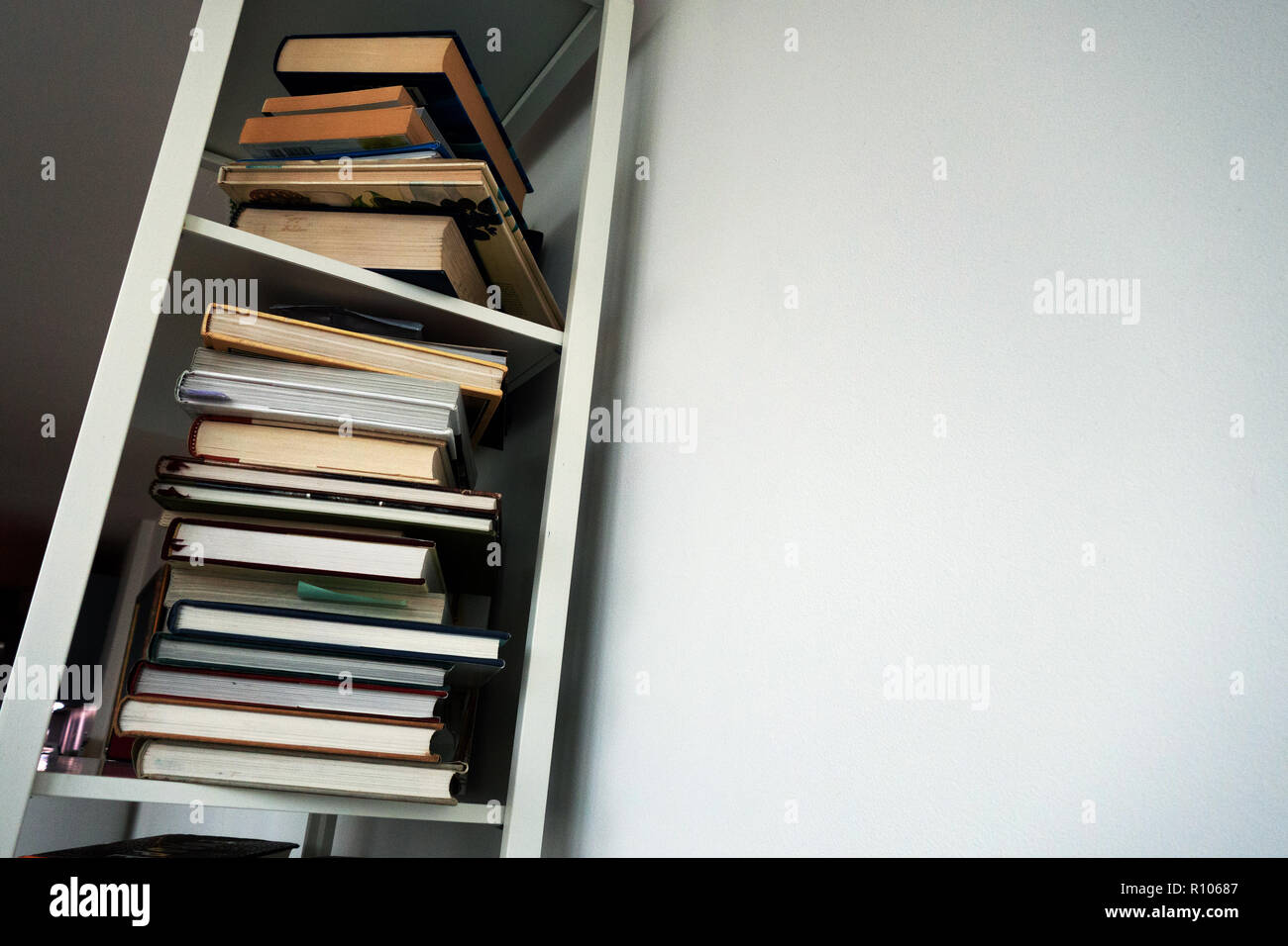 Books stack vintage tall hi-res stock photography and images - Alamy