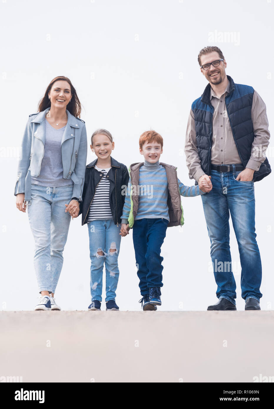 blurred image of a family with two children Stock Photo - Alamy