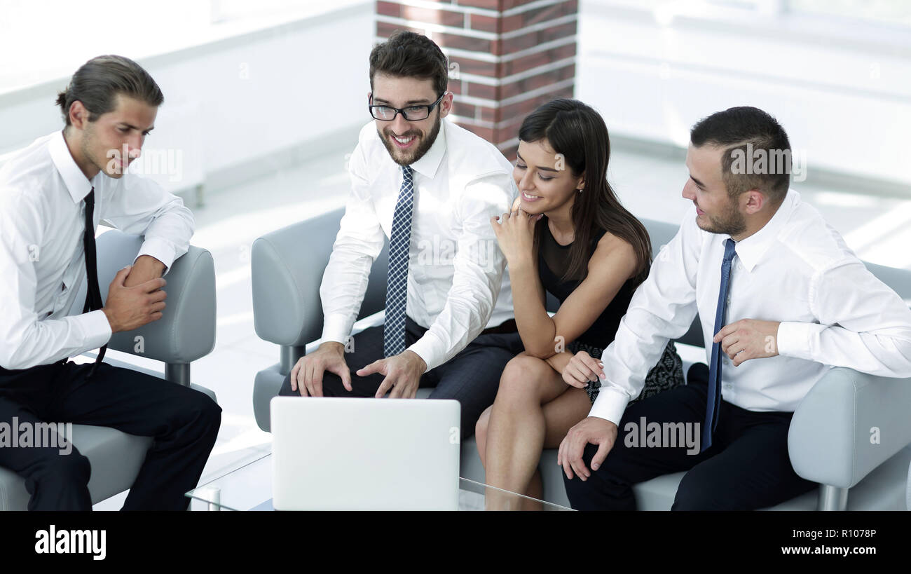 employees sitting in the lobby of the office Stock Photo - Alamy