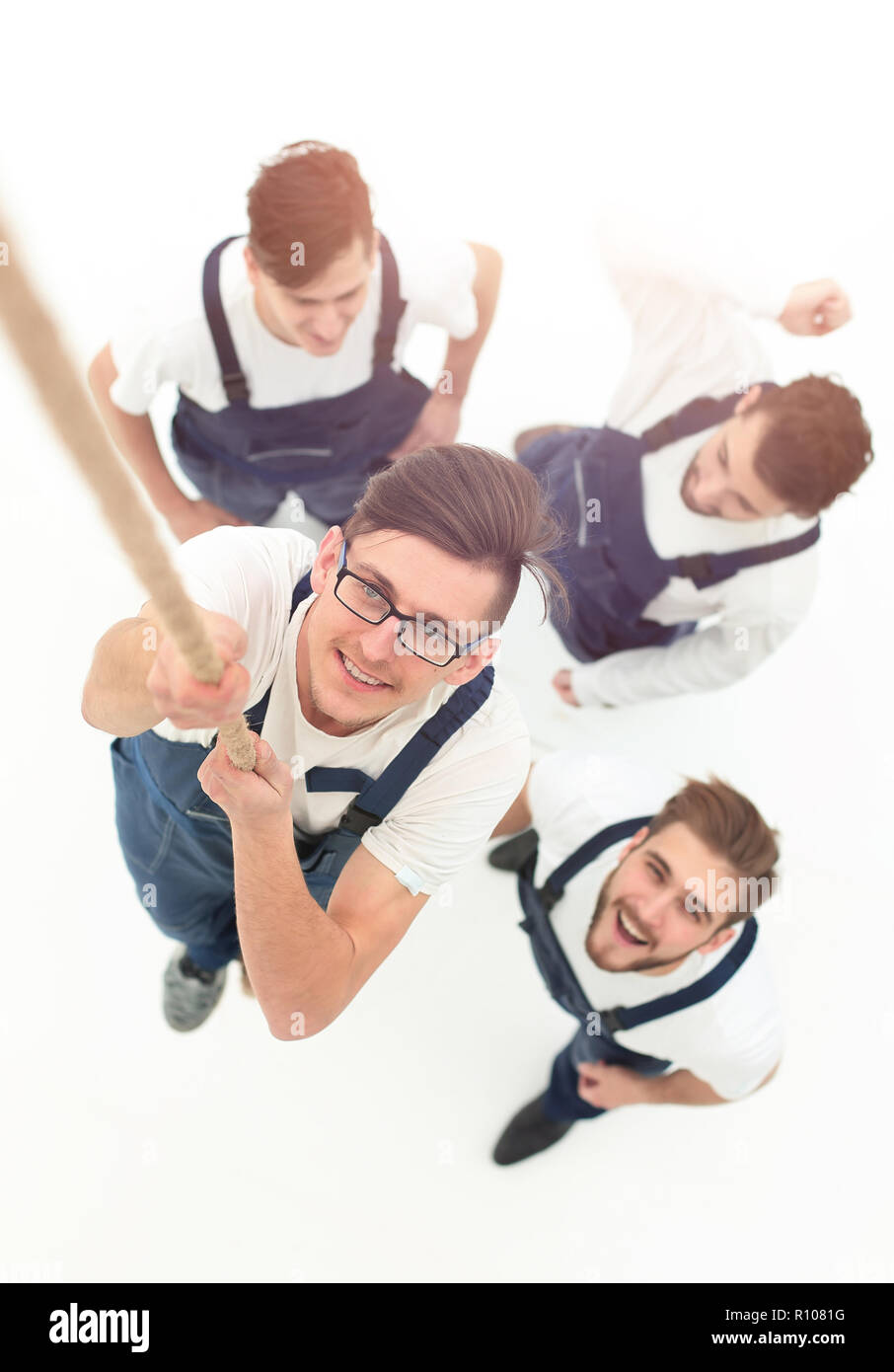 team, helping the leader to climb up the rope Stock Photo - Alamy