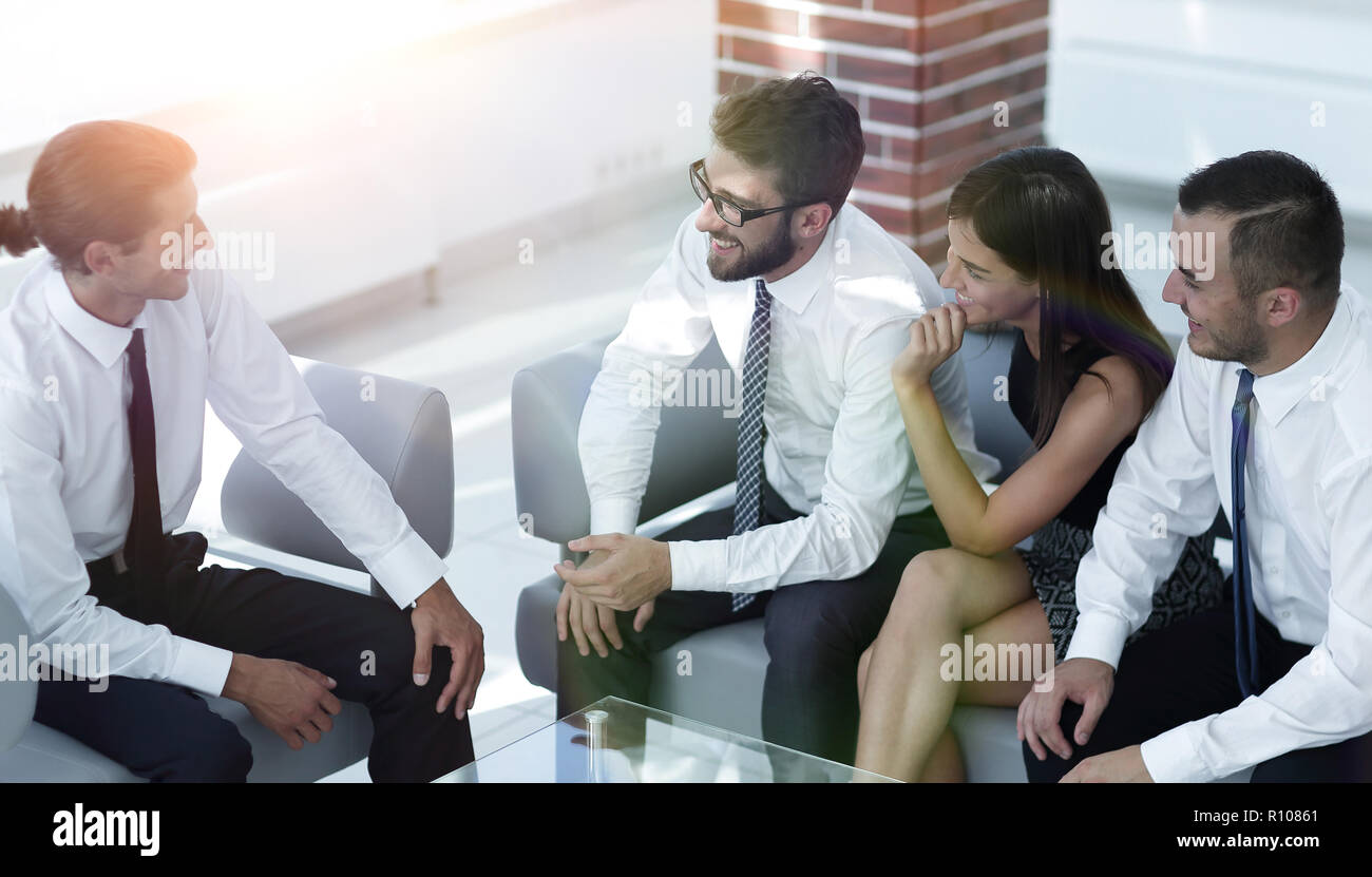 employees sitting in the lobby of the office Stock Photo - Alamy