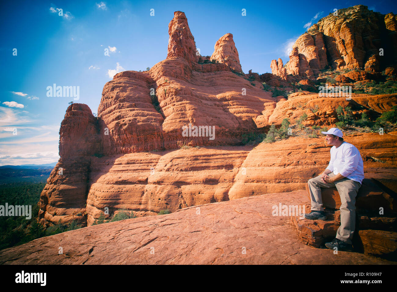 Man hiker relaxing and enjoying the scenic lookout on Chicken Point in ...