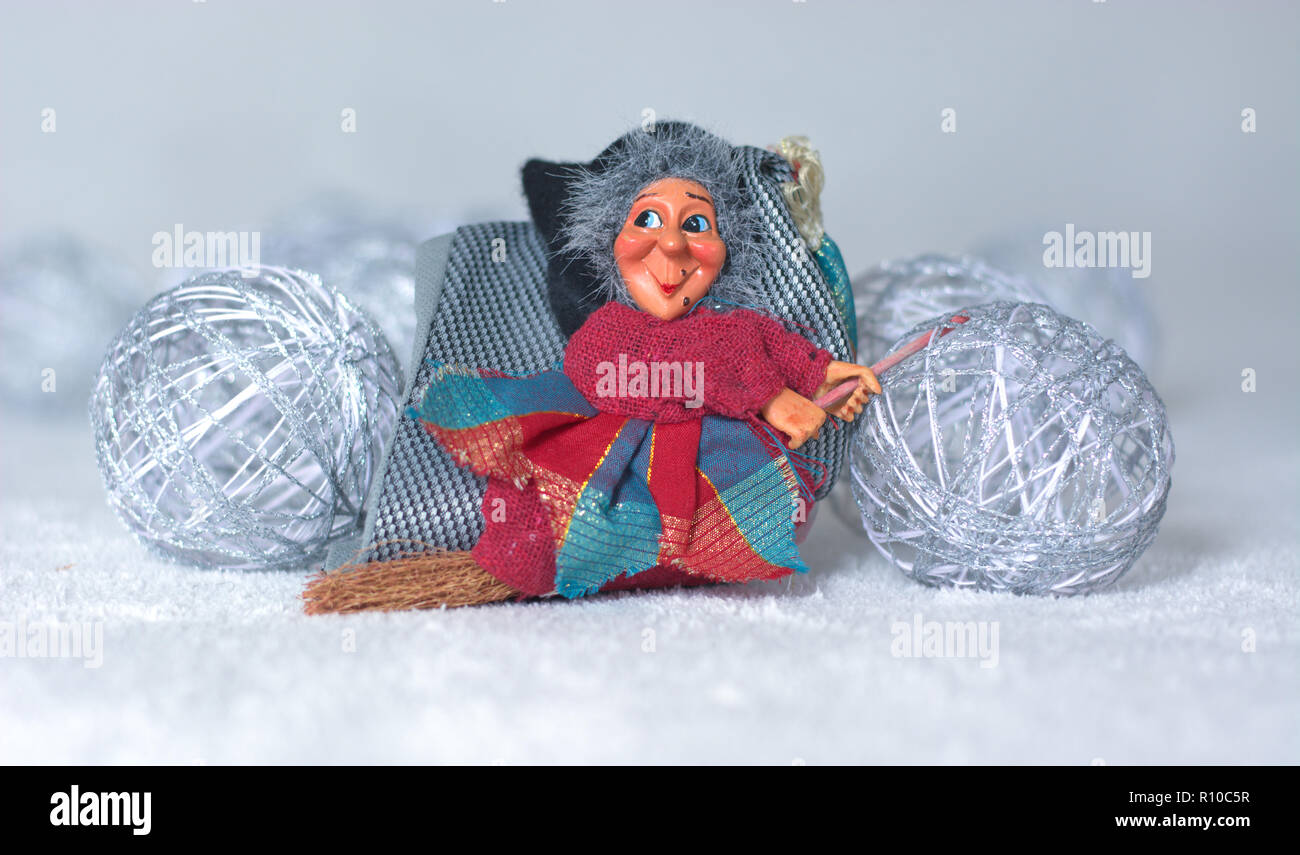 the befana arrives with the broom Stock Photo - Alamy