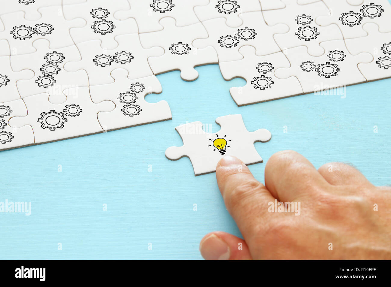 Concept image of revealing an idea, finding the right solution during ...