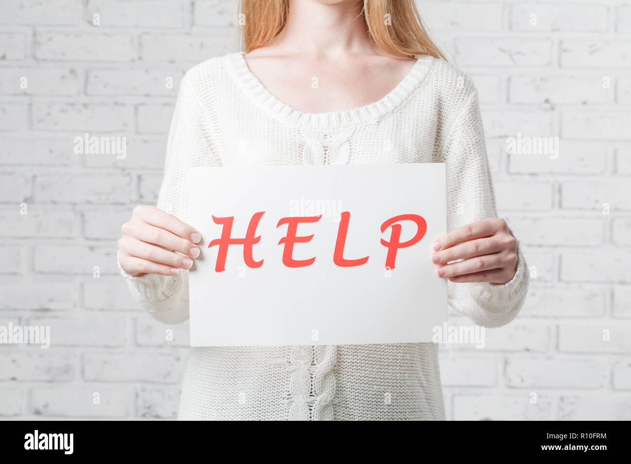 Girl holding paper inscription hi-res stock photography and images - Alamy
