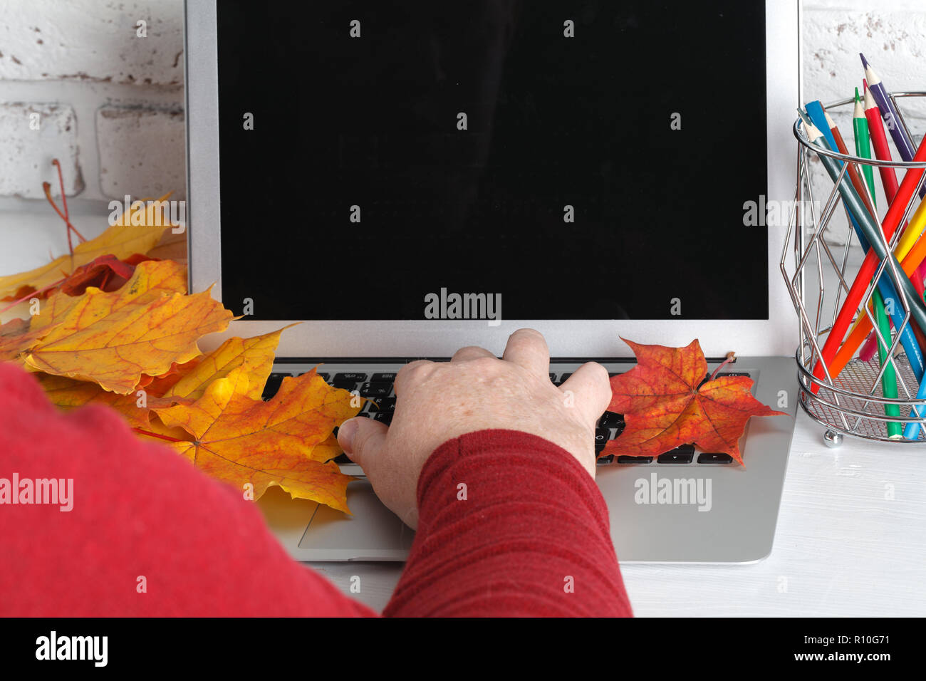 Hands multitasking man working on laptop connecting wifi internet ...