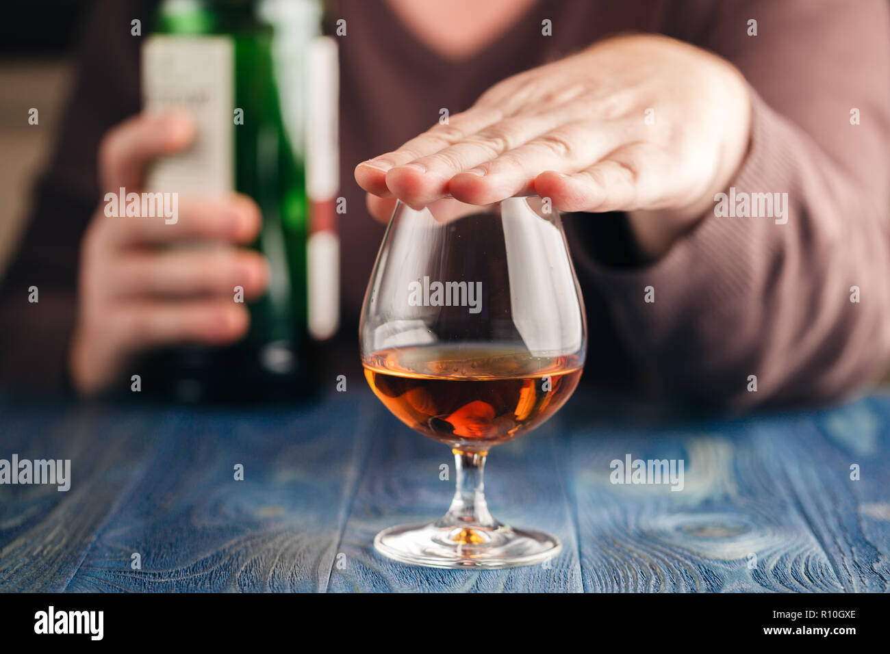 problem of alcoholism, man stop drinking more Stock Photo - Alamy