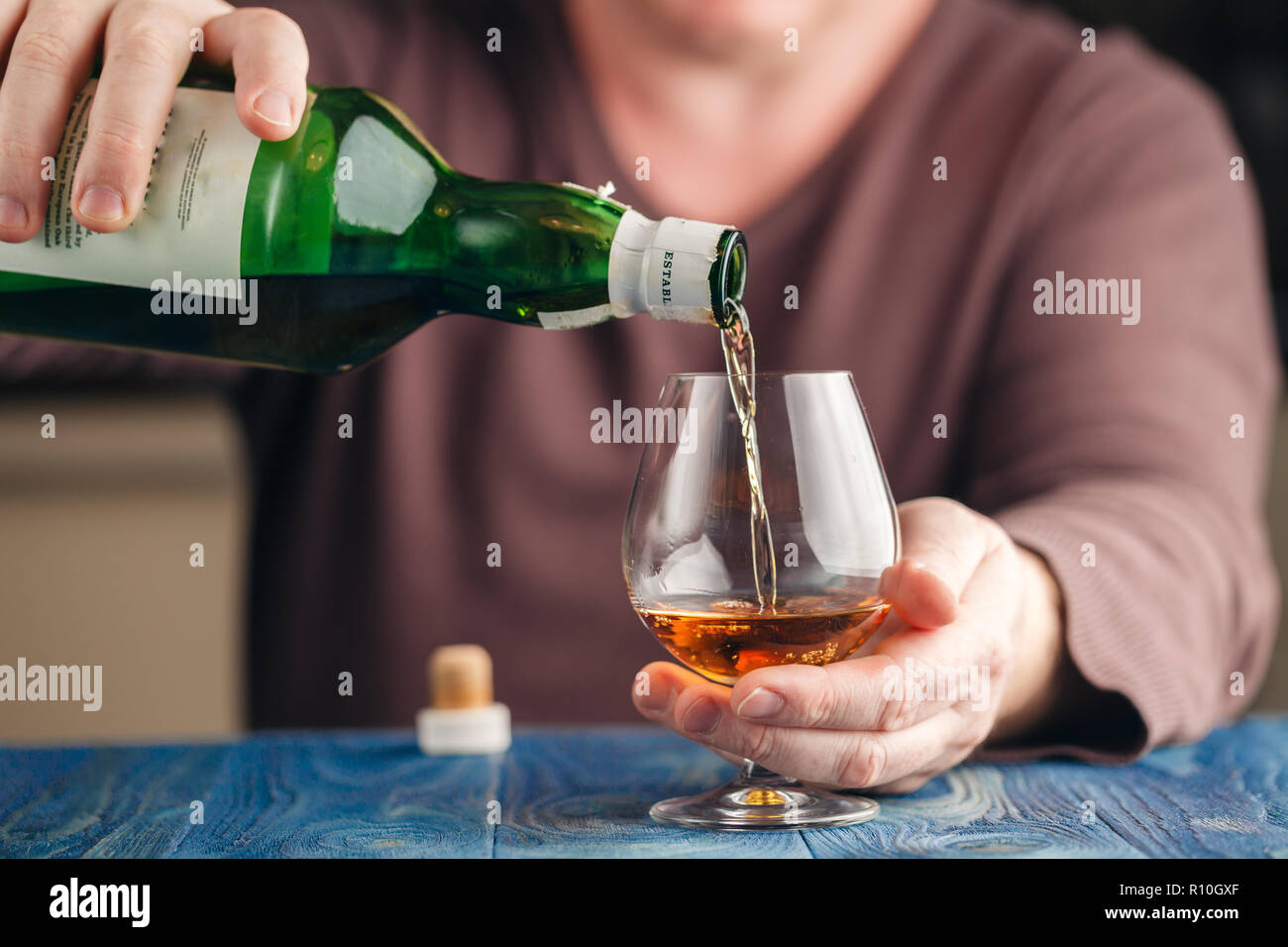 Man drinking malt whisky in relax time Stock Photo - Alamy