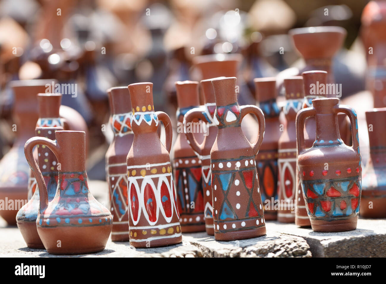 Traditional handmade pottery on display at street market in Tbilisi ...