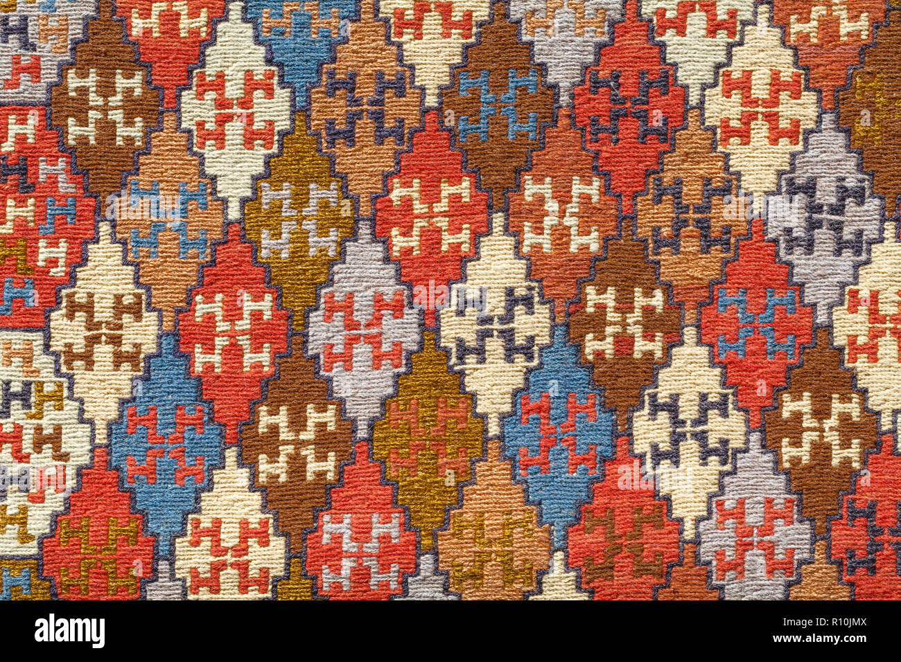 The traditional patterns on Georgian rug Stock Photo - Alamy