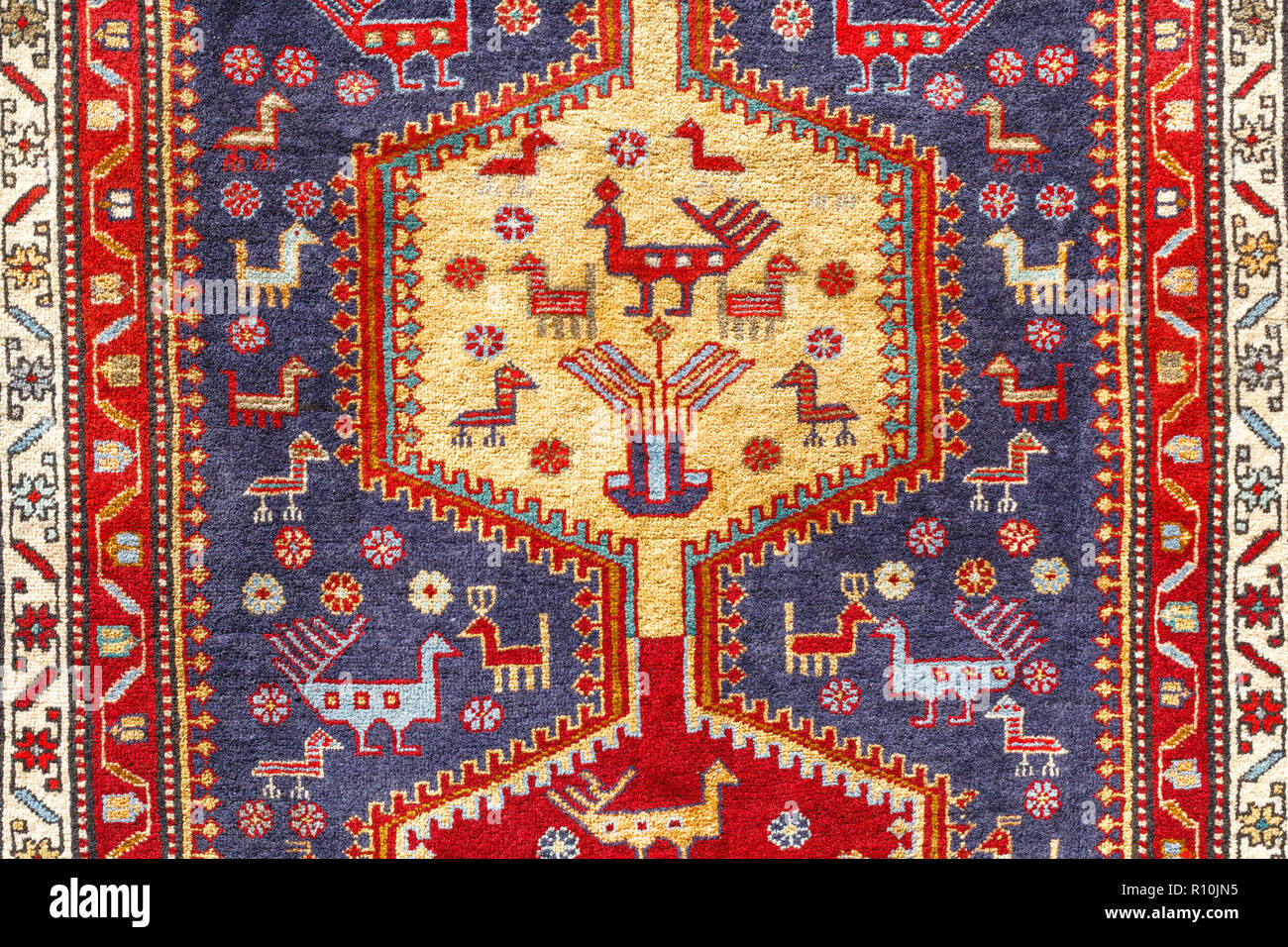 The traditional patterns on Georgian rug Stock Photo - Alamy