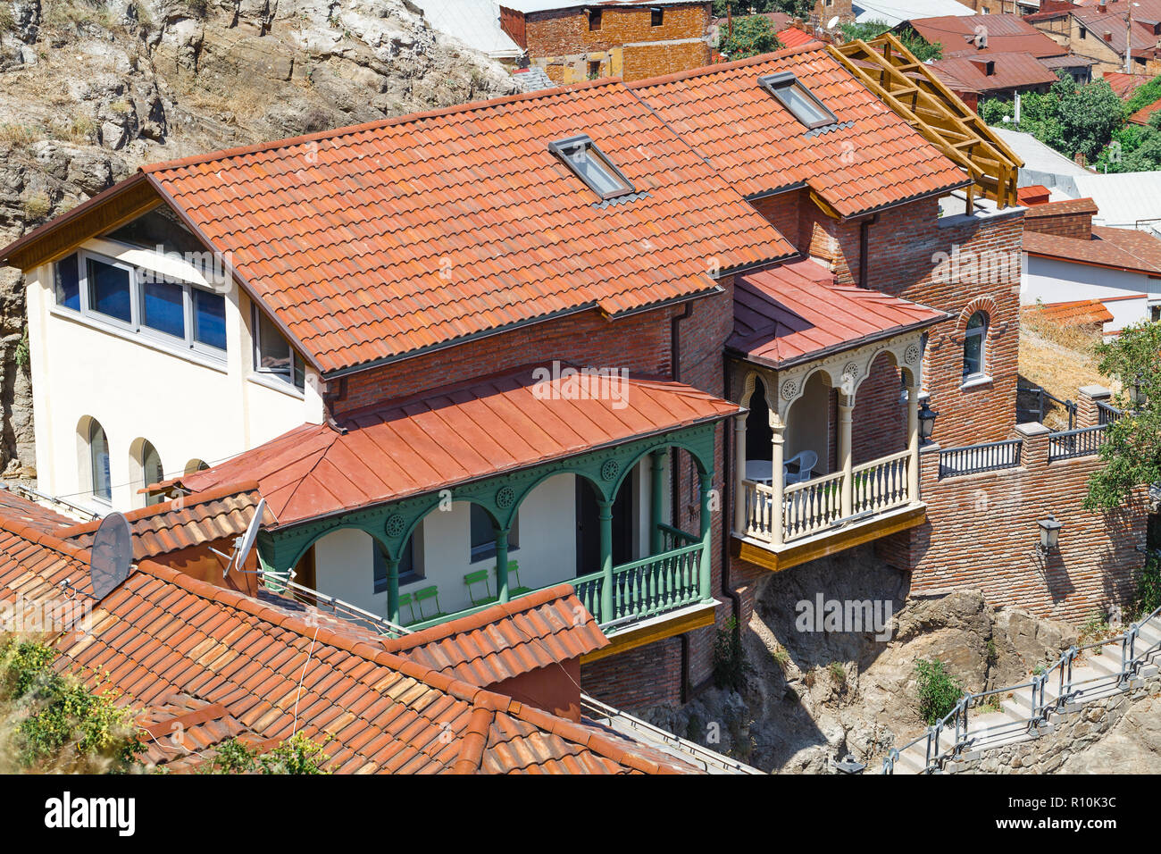 Colorful traditional houses with wooden carved balconies in the Old ...