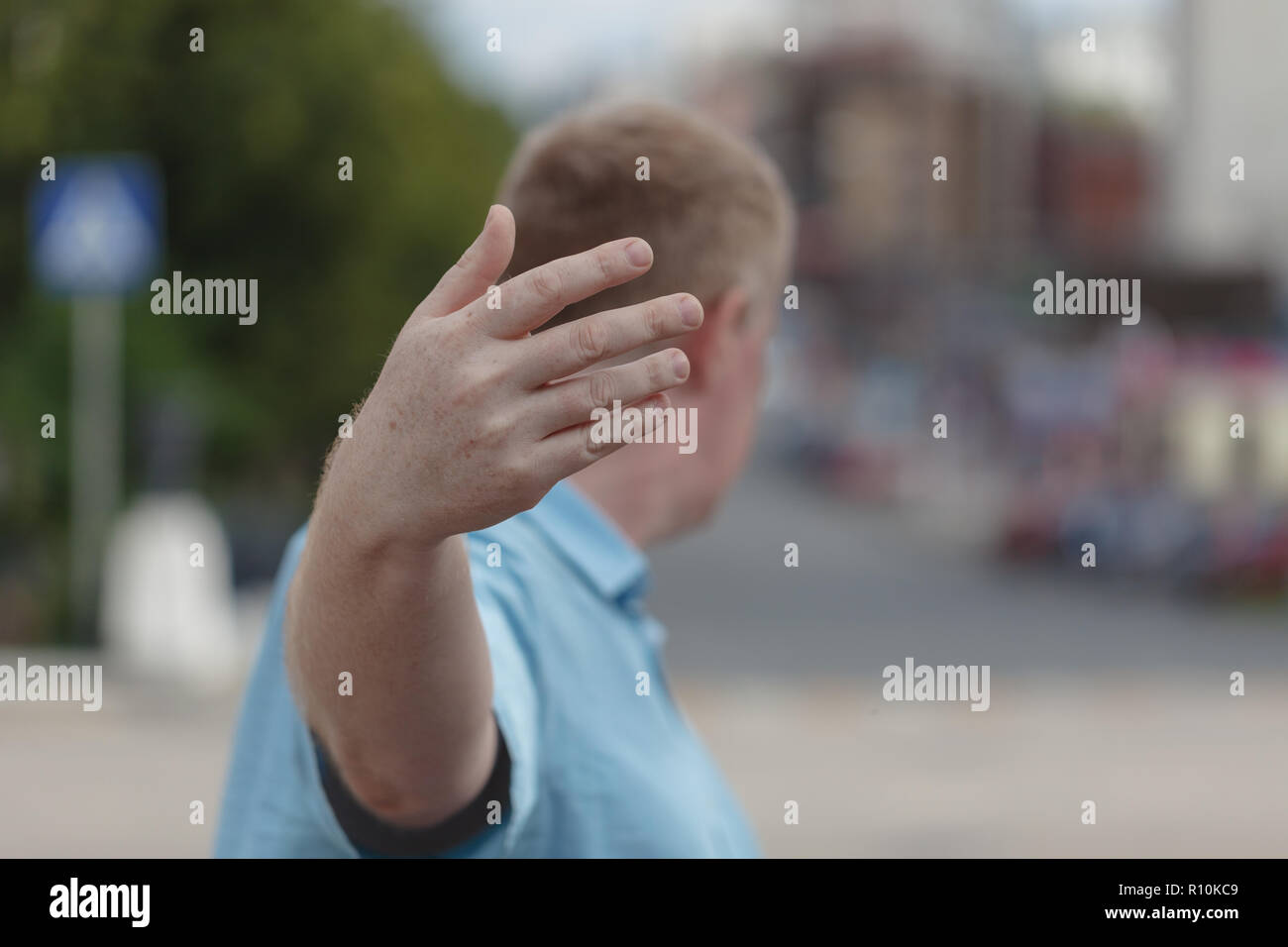 Follow Me. Young happy guy pulls the hand Stock Photo - Alamy