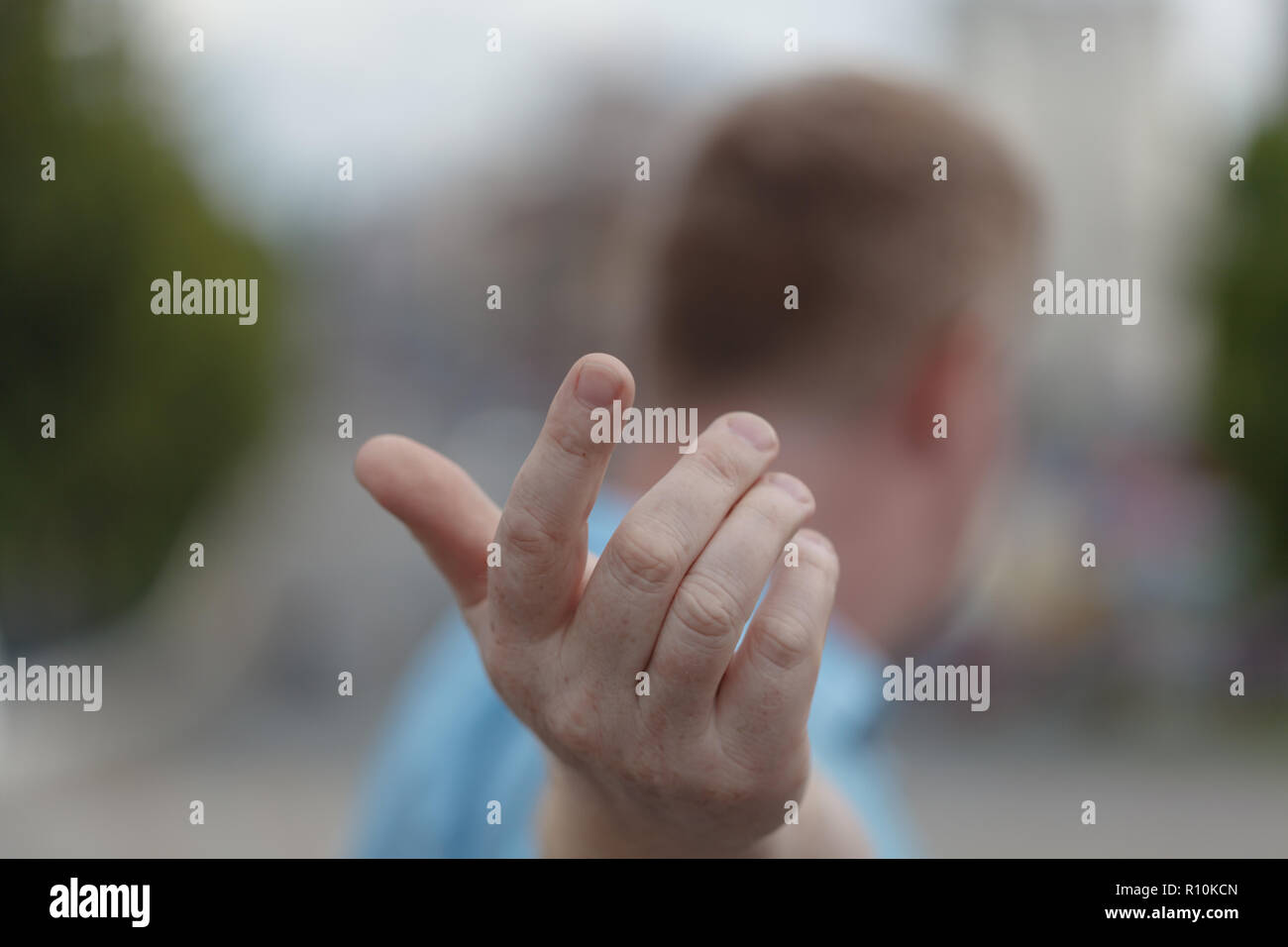 Follow Me. Young happy guy pulls the hand Stock Photo - Alamy