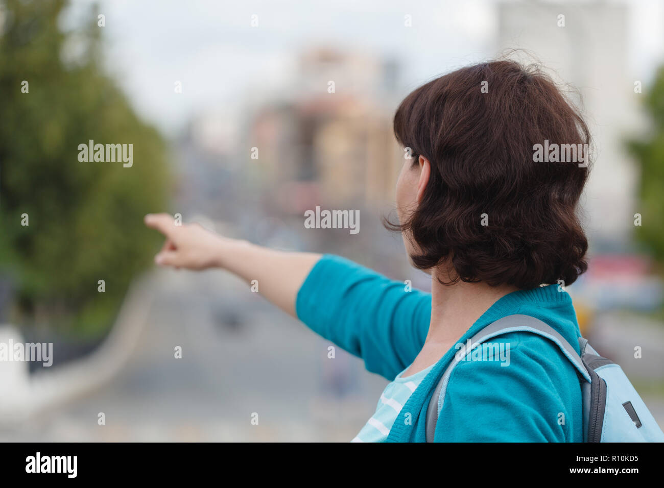 woman show left side hand show forefinger/index finger, correct ...