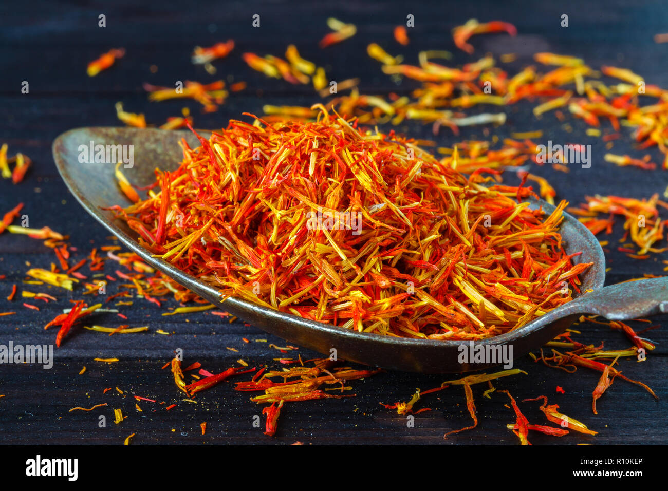 natural saffron on wooden background Stock Photo - Alamy