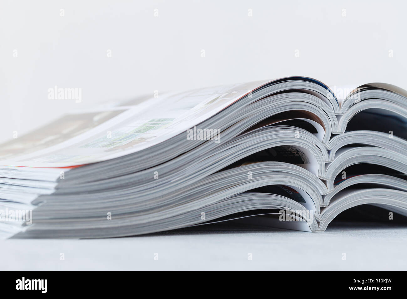 close up stacking of magazine Stock Photo - Alamy