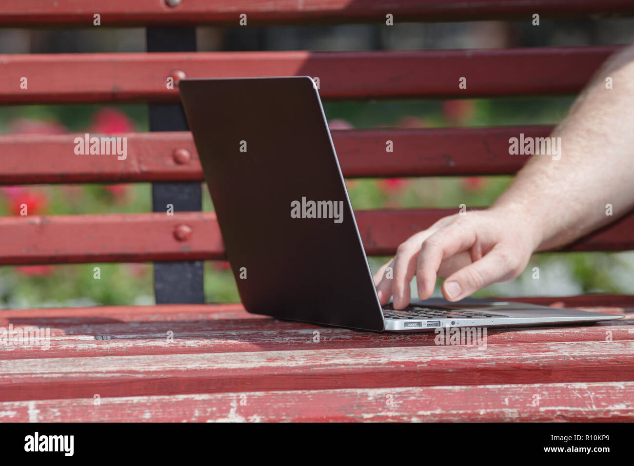 Close up view of open laptop on bench, freelance work concept Stock ...