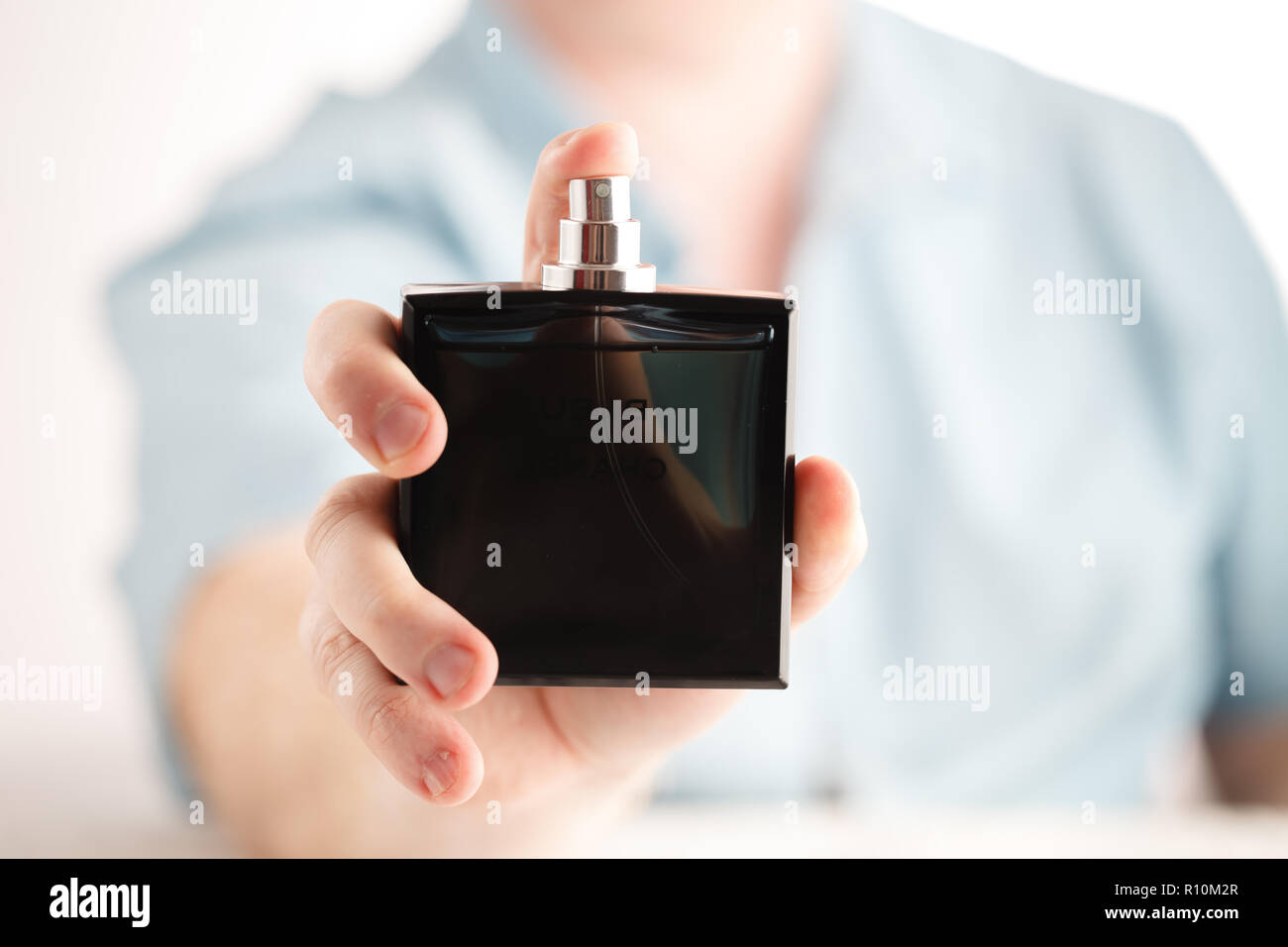 Man with perfume Stock Photo - Alamy