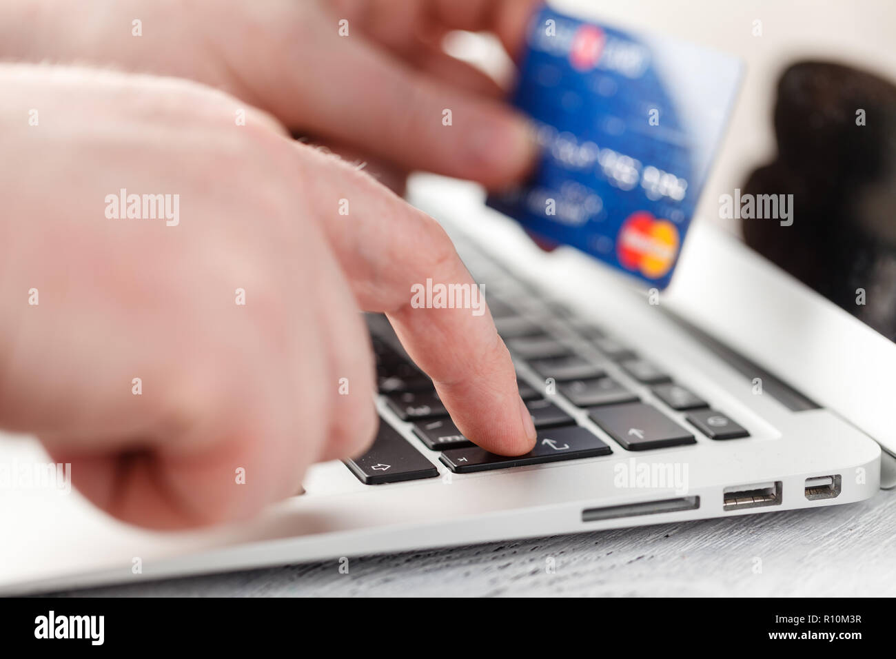 Woman entering data in laptop hi-res stock photography and images - Alamy