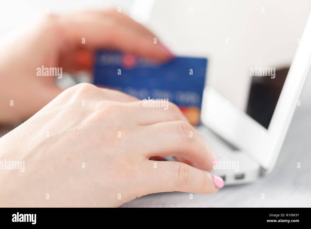 online payment,Woman's hands holding and using credit card for online ...