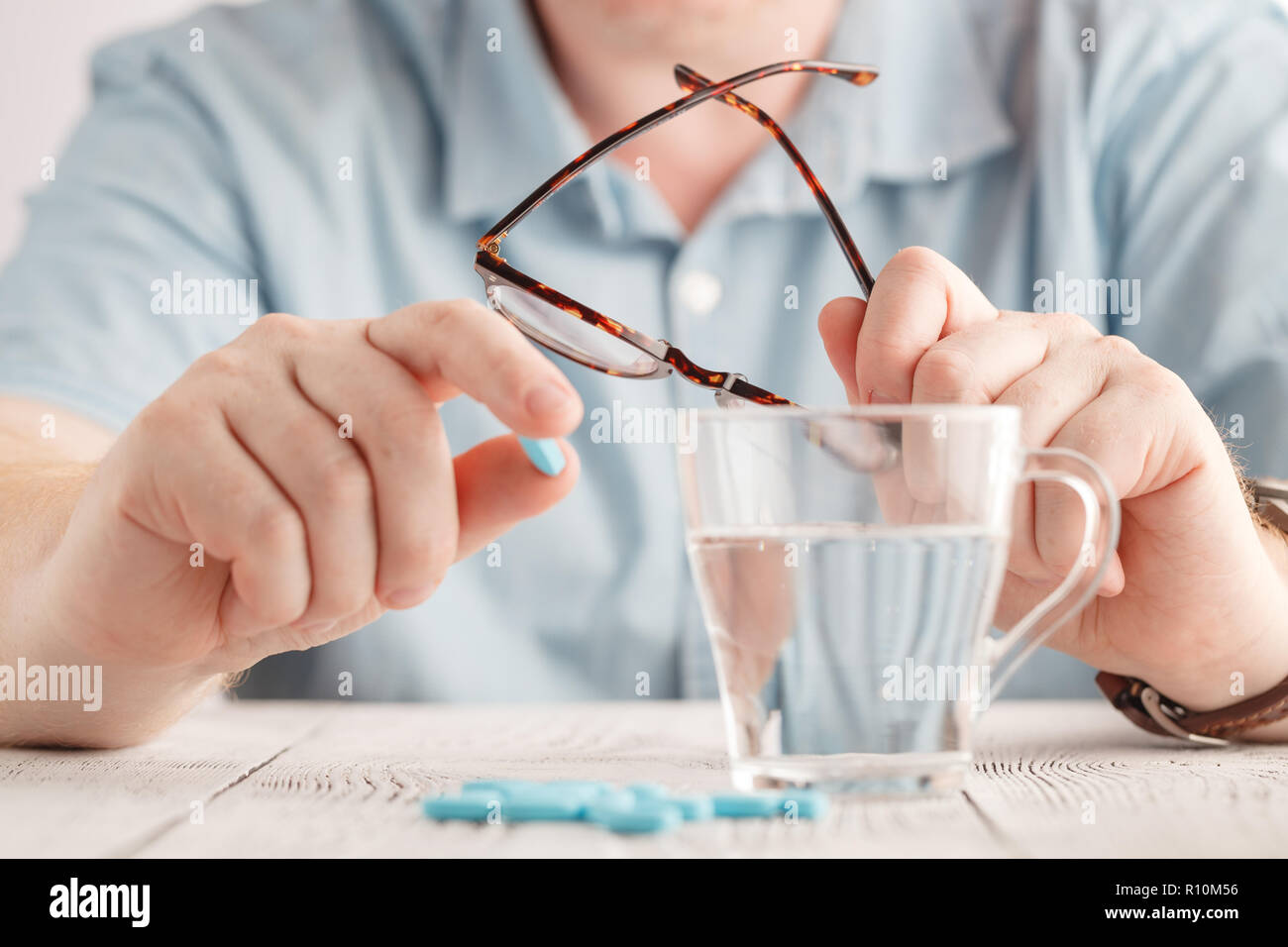Man taking drugs. Drugs on hand Stock Photo - Alamy