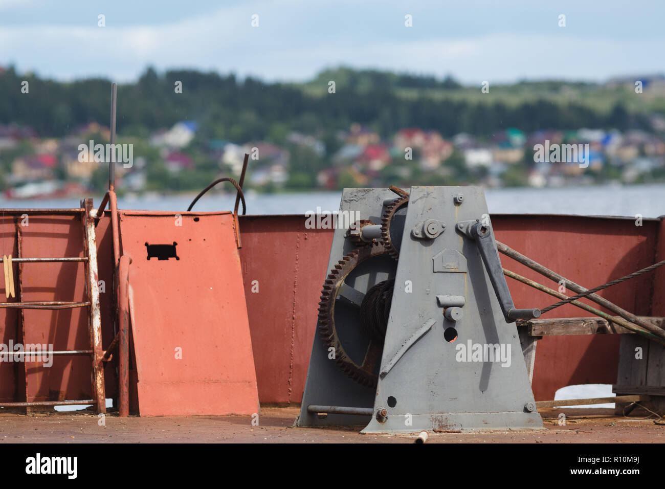 Rusty old boat winch on the dock Stock Photo - Alamy