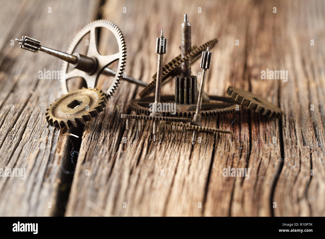 rusty mechanism from the old clock on the texture background/vintage ...