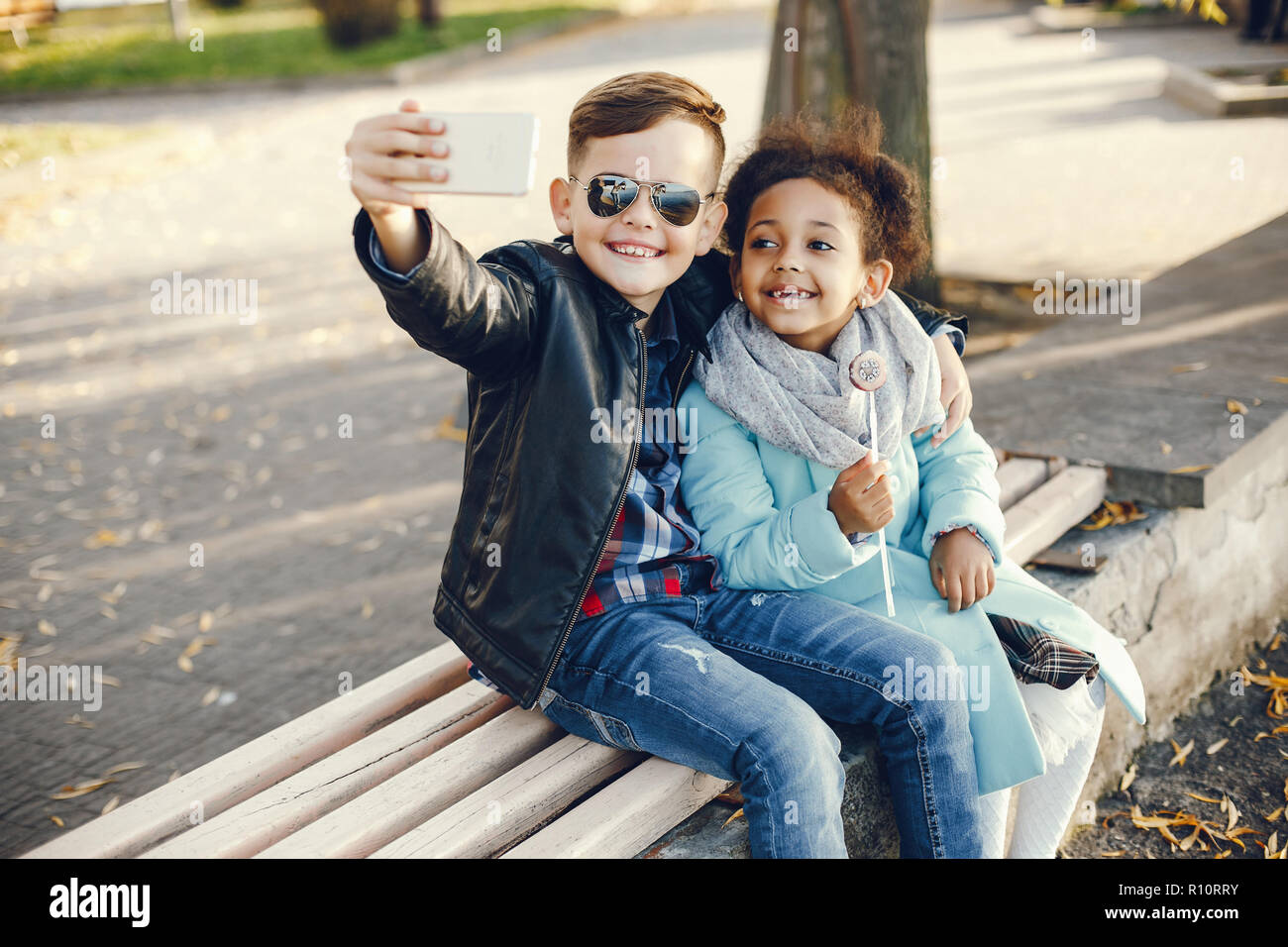 children in a park Stock Photo - Alamy